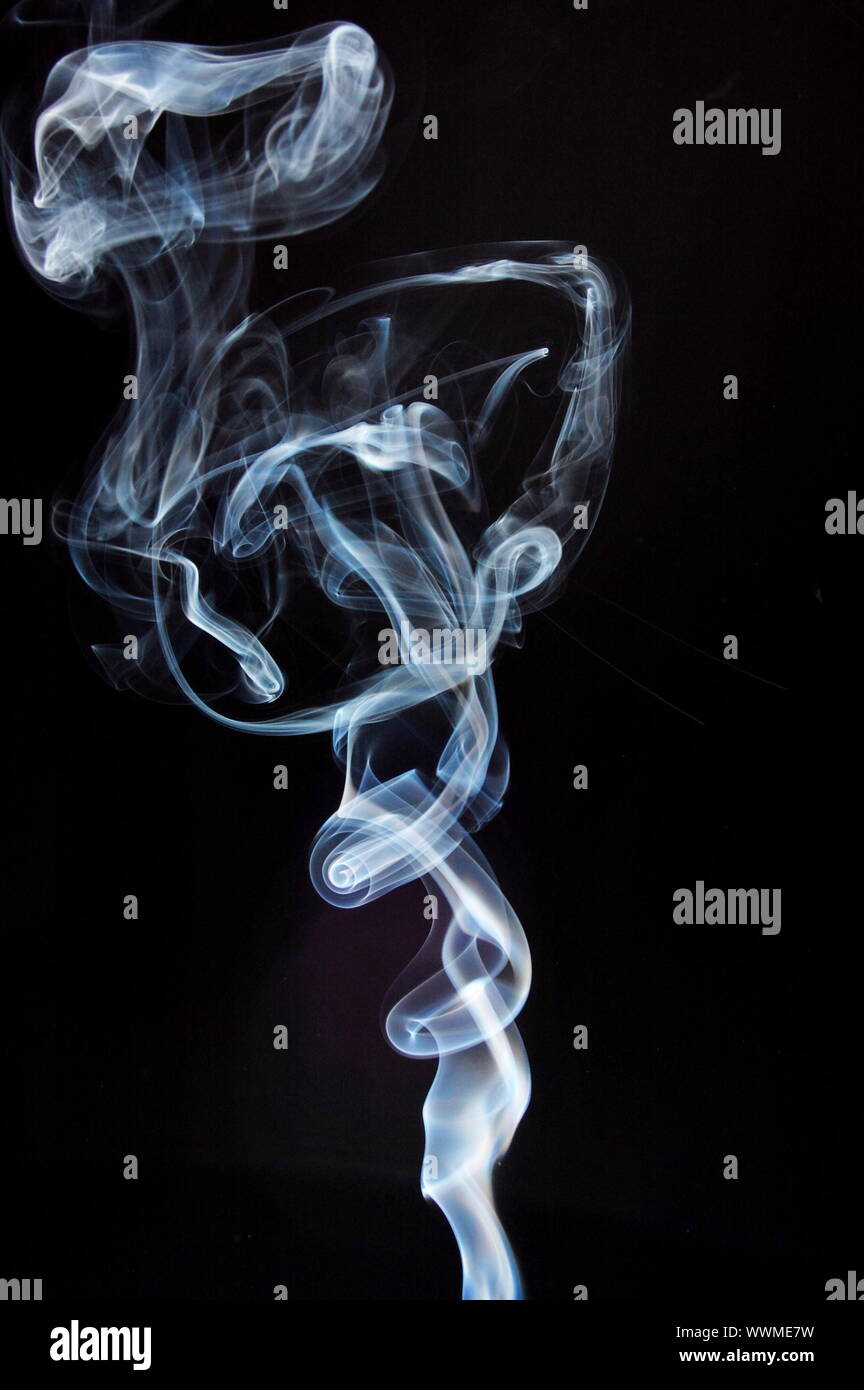 abstract smoke background or smoking concept on black Stock Photo - Alamy