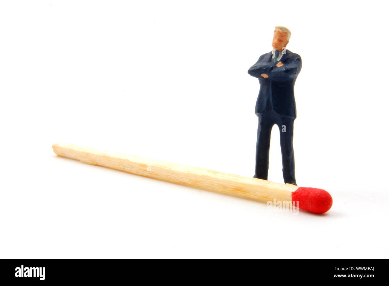 business man and matches isolated on white background Stock Photo - Alamy