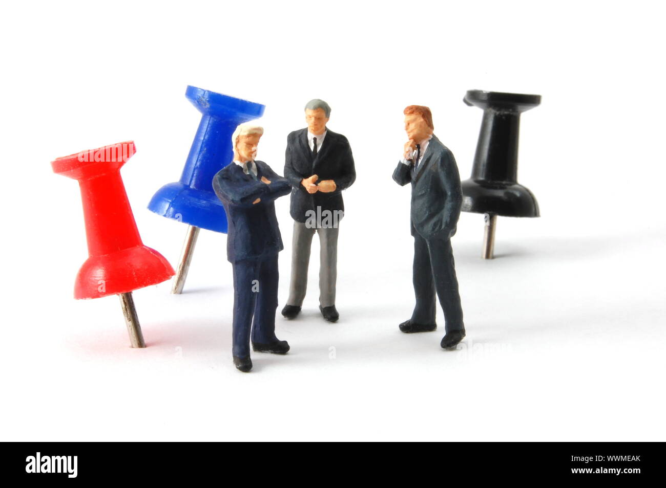 business man and push pin isolated on white background Stock Photo - Alamy