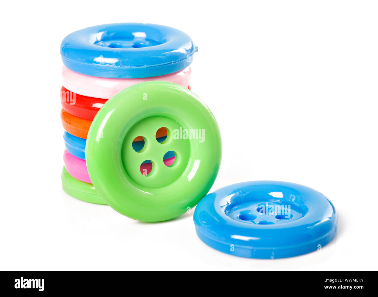Colorful buttons stacked up Stock Photo - Alamy