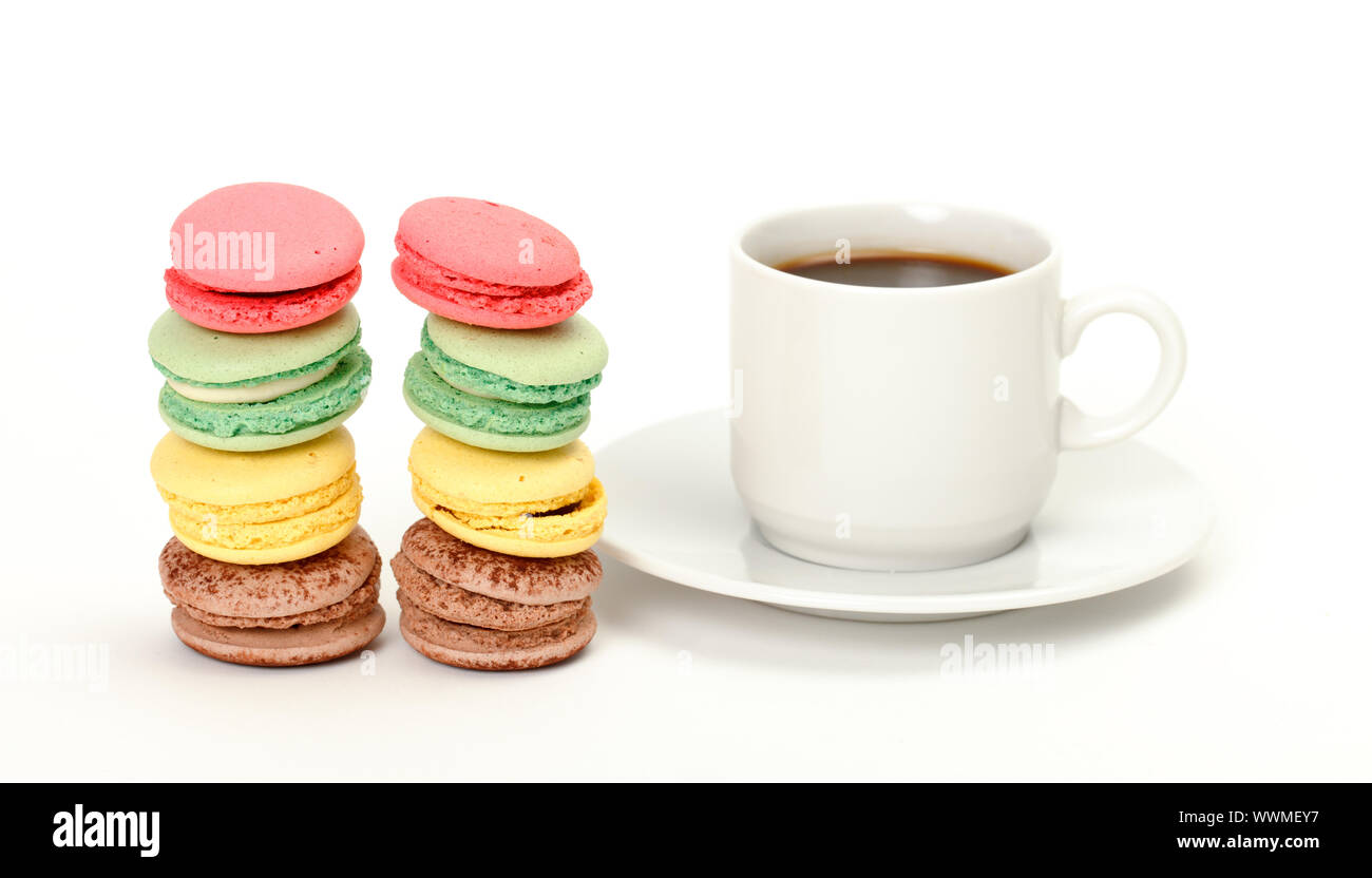 Colorful Macaroon and cup of coffee on white background Stock Photo - Alamy