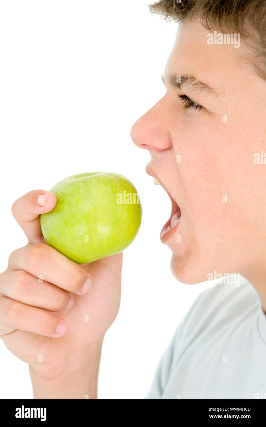 Boy eating apple Stock Photo - Alamy