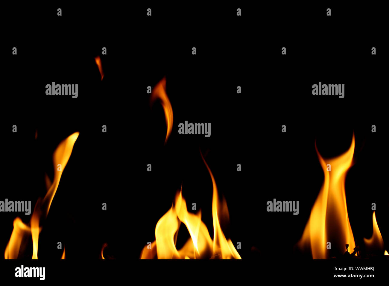 inferno flame fire on black background close up Stock Photo - Alamy