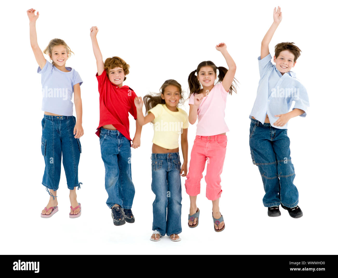 Five friends jumping and smiling Stock Photo - Alamy