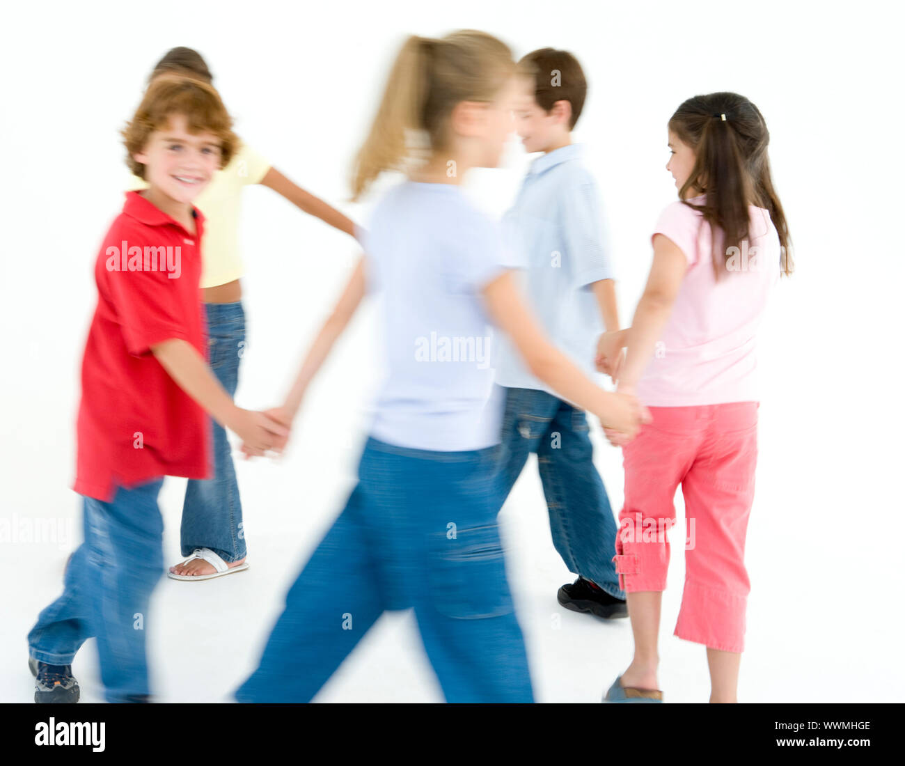 Children playing ring ring roses hi-res stock photography and images ...