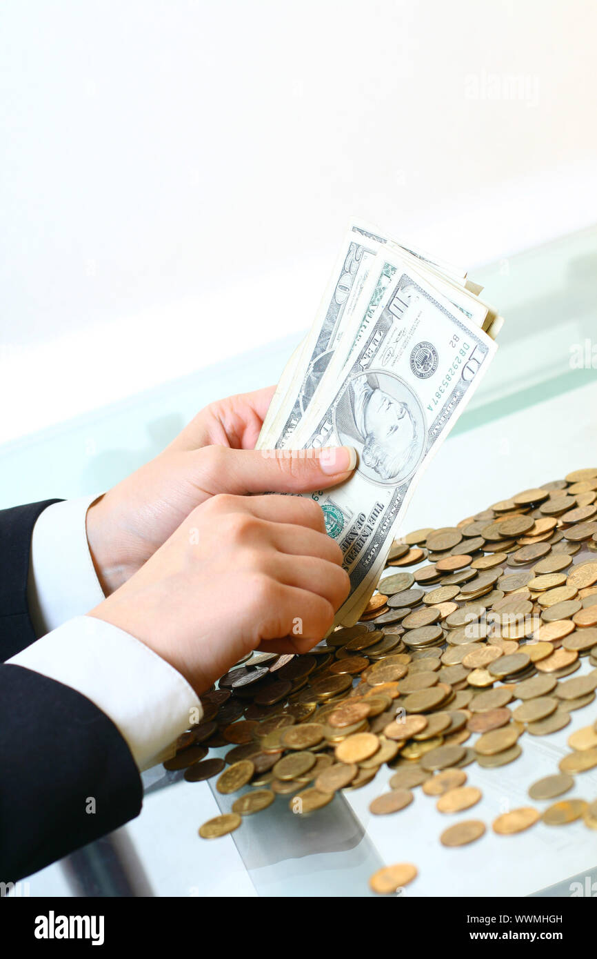 hands counting dollar money on white background Stock Photo - Alamy