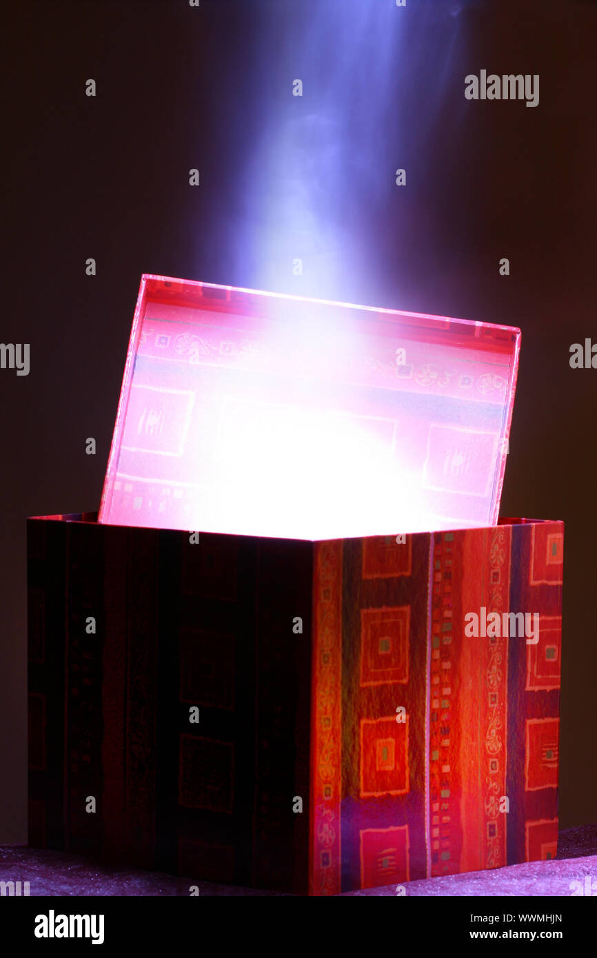 holiday magic box treasure gift inside Stock Photo - Alamy