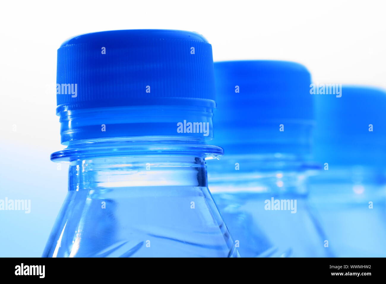 clear cold blue water in bottle Stock Photo - Alamy