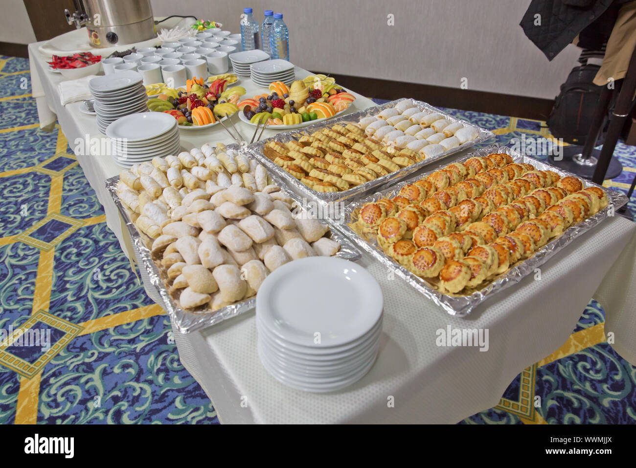 Luxury hotel restaurant deserts open buffet. Table with deserts, Sweet ...