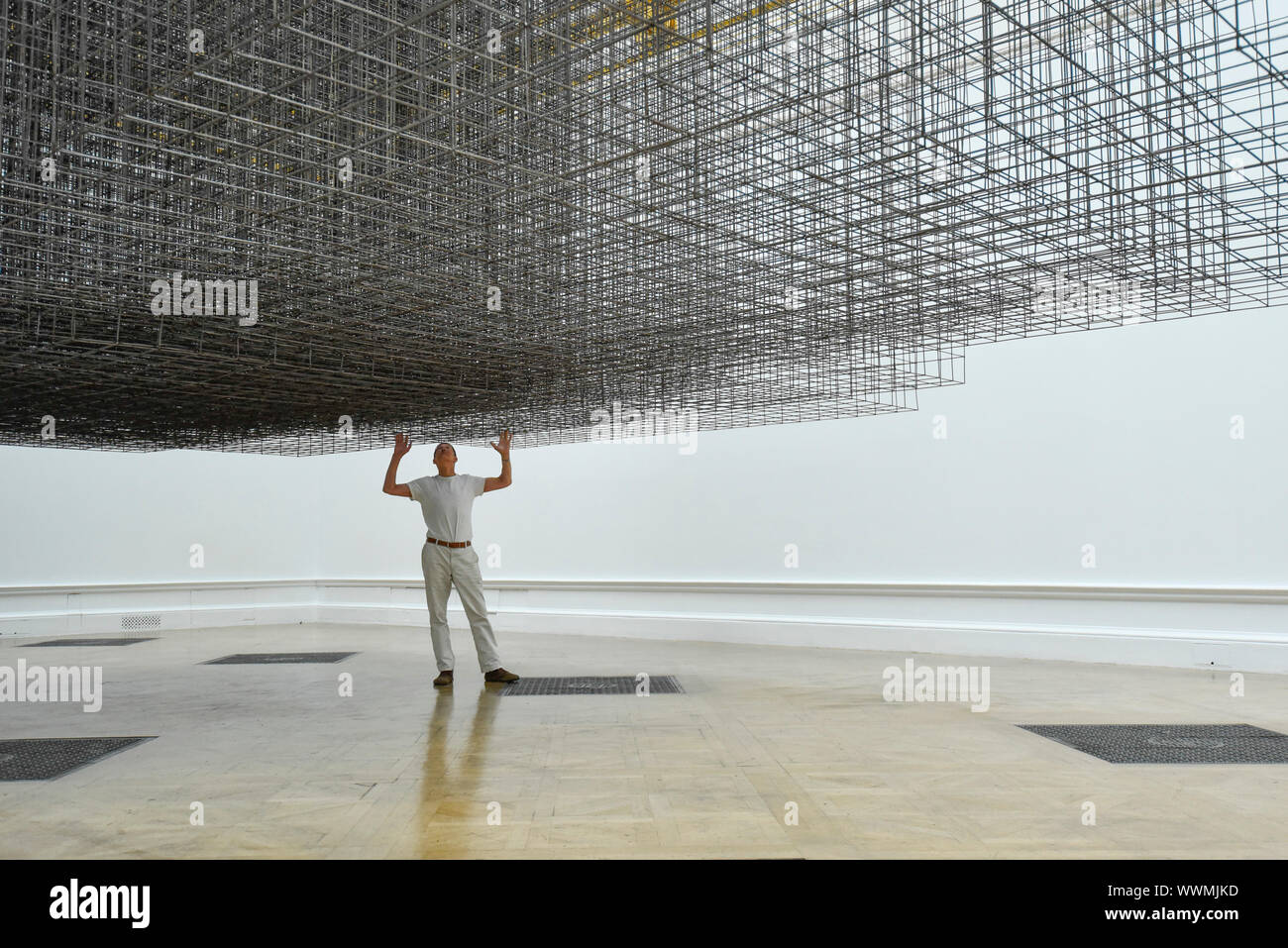 London, UK. 16 September 2019. Antony Gormley RA poses next to his work ...