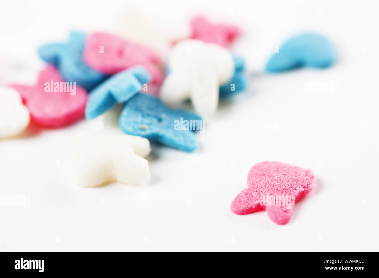 Closeup view of teeth shaped little candies Stock Photo - Alamy