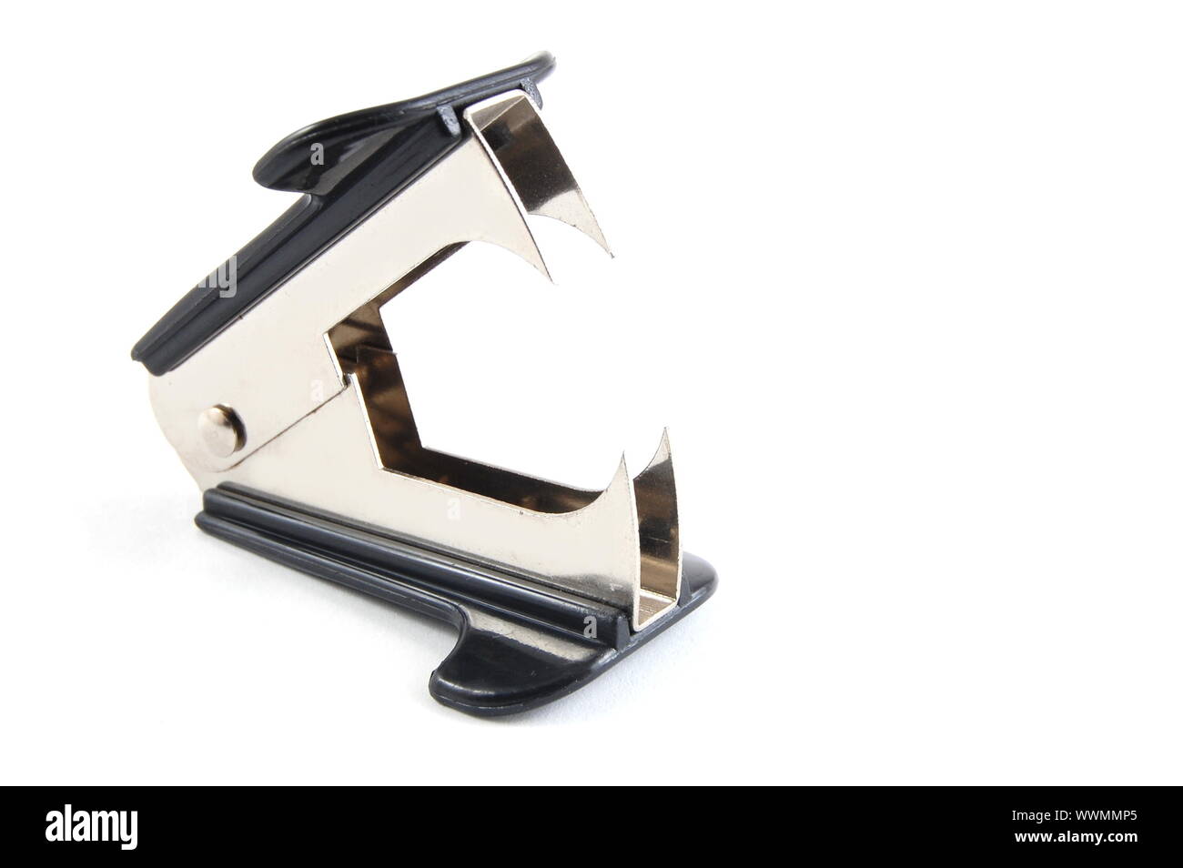 Staple remover isolated on a white background Stock Photo - Alamy