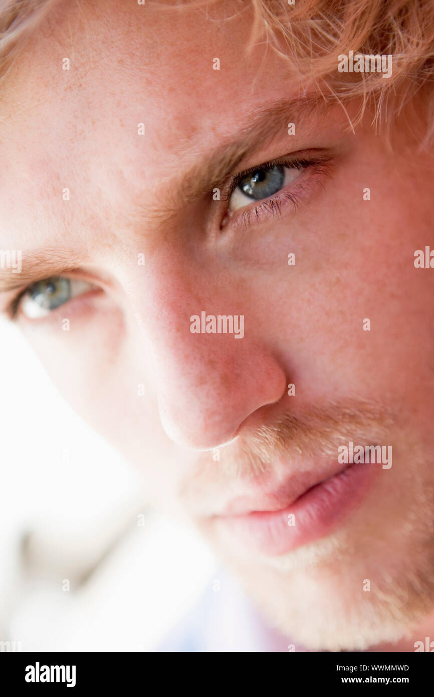 Head shot of man thinking Stock Photo - Alamy