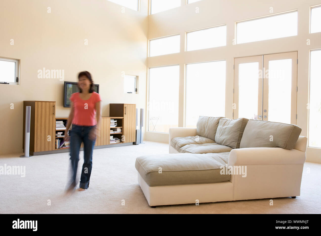 Mature walking inside house hi-res stock photography and images - Alamy