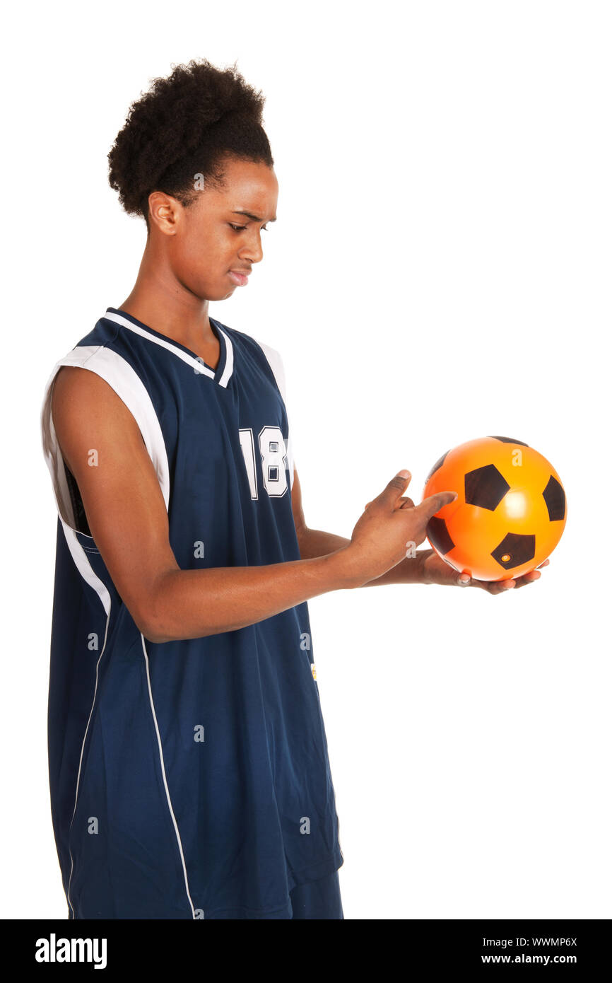 Black basketball player with soccer ball Stock Photo - Alamy