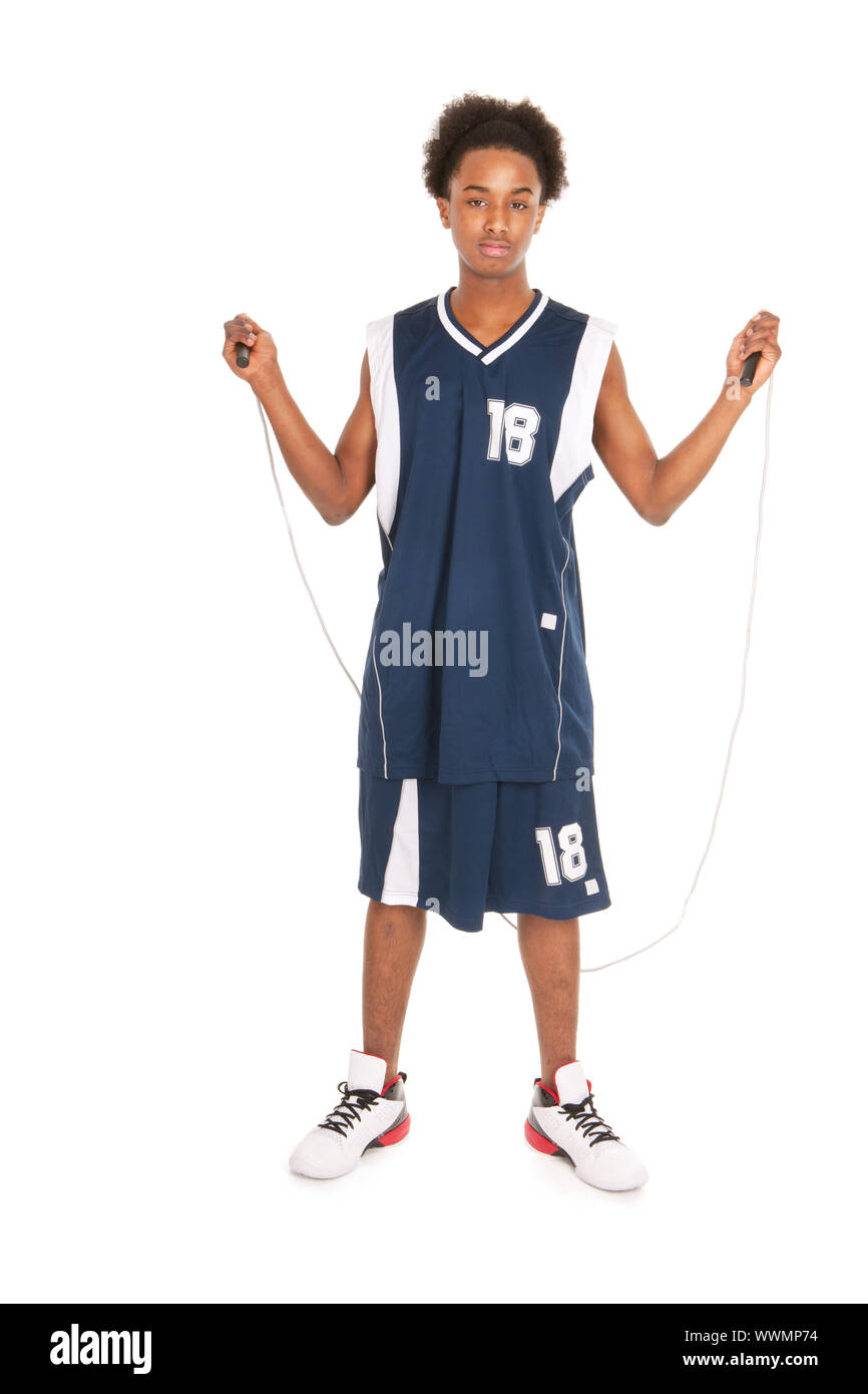 Young black boy is doing workout with jumping rope Stock Photo - Alamy