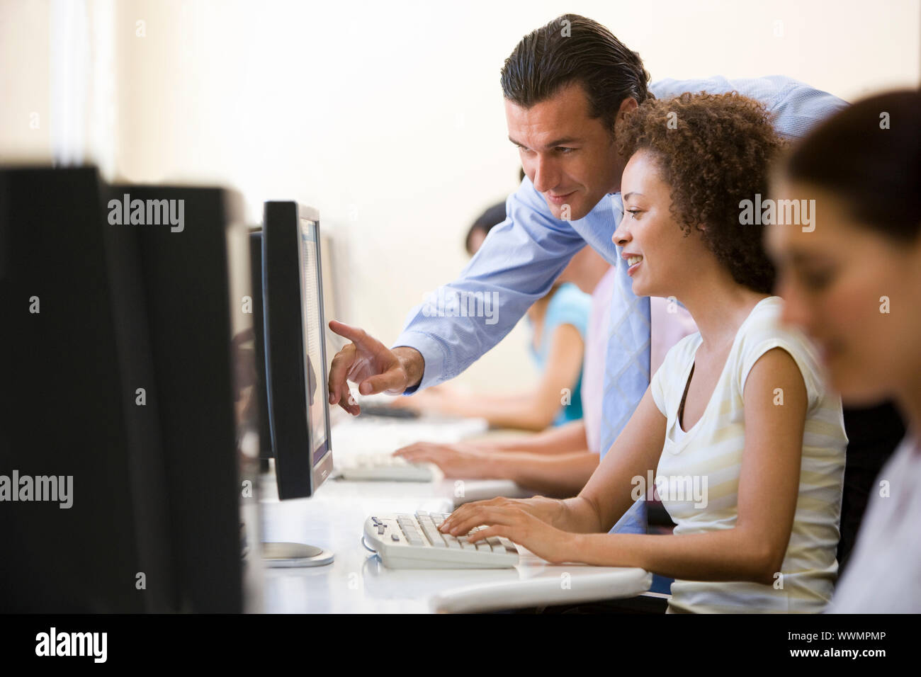 Man supervising employees hi-res stock photography and images - Alamy