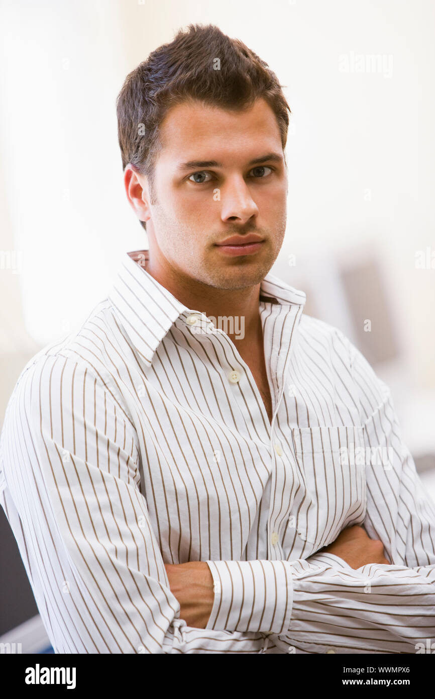Man standing in computer room Stock Photo - Alamy