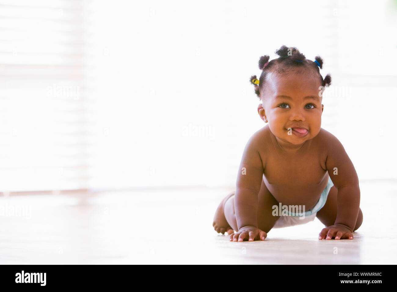 Crawling baby african american hi-res stock photography and images - Alamy