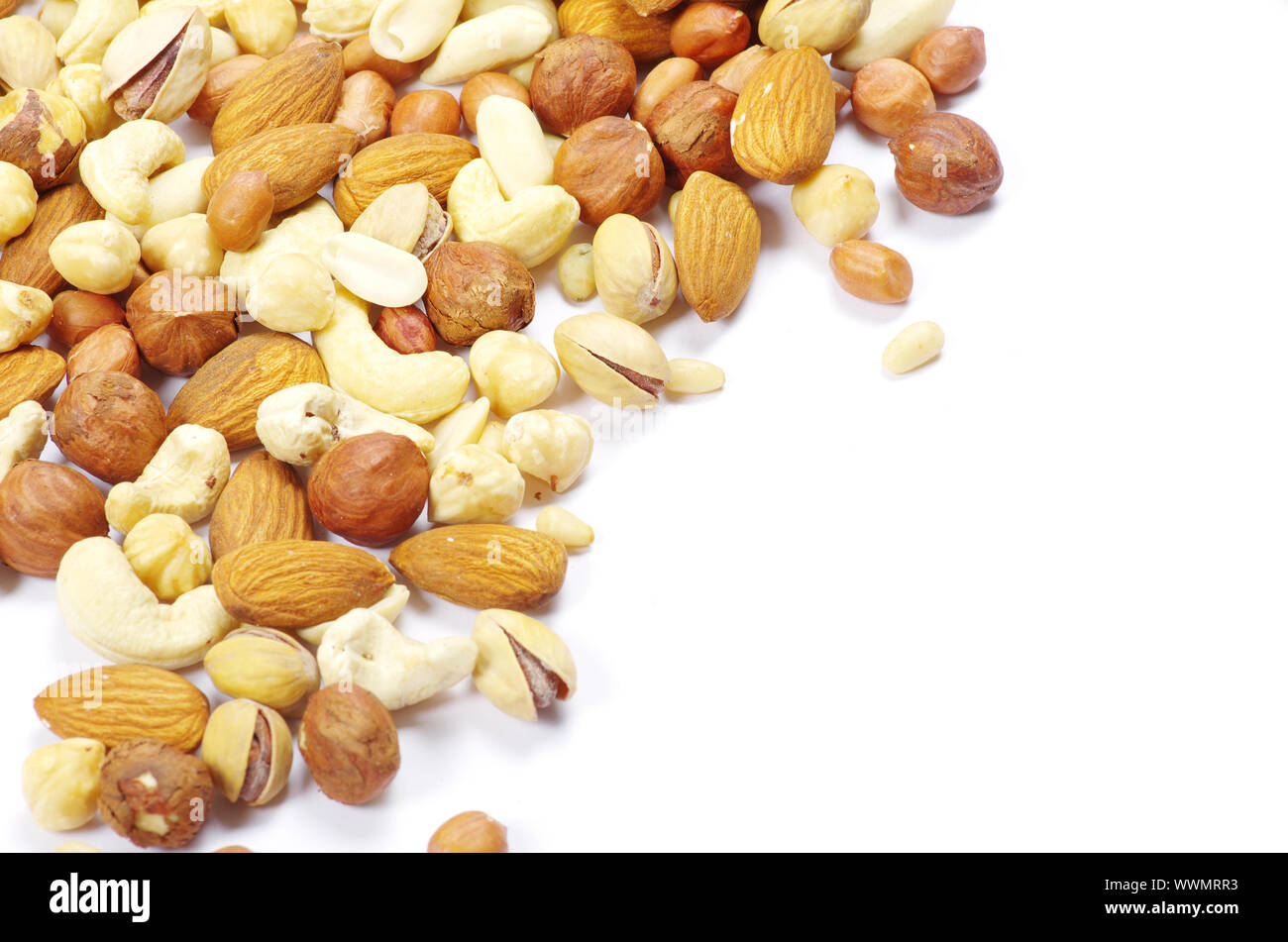 Assorted mixed nuts on white background Stock Photo - Alamy