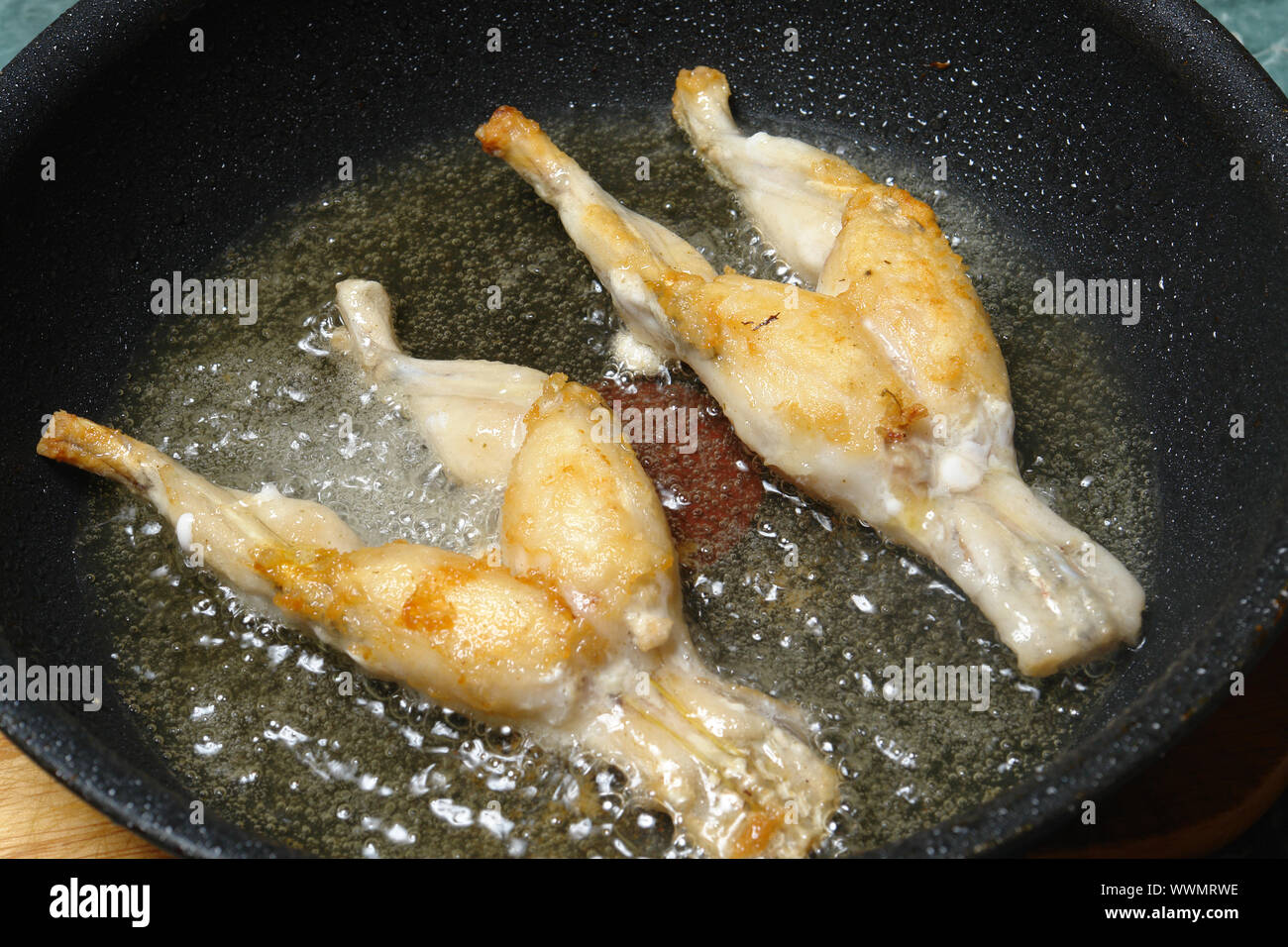 fried frog thighs Stock Photo - Alamy