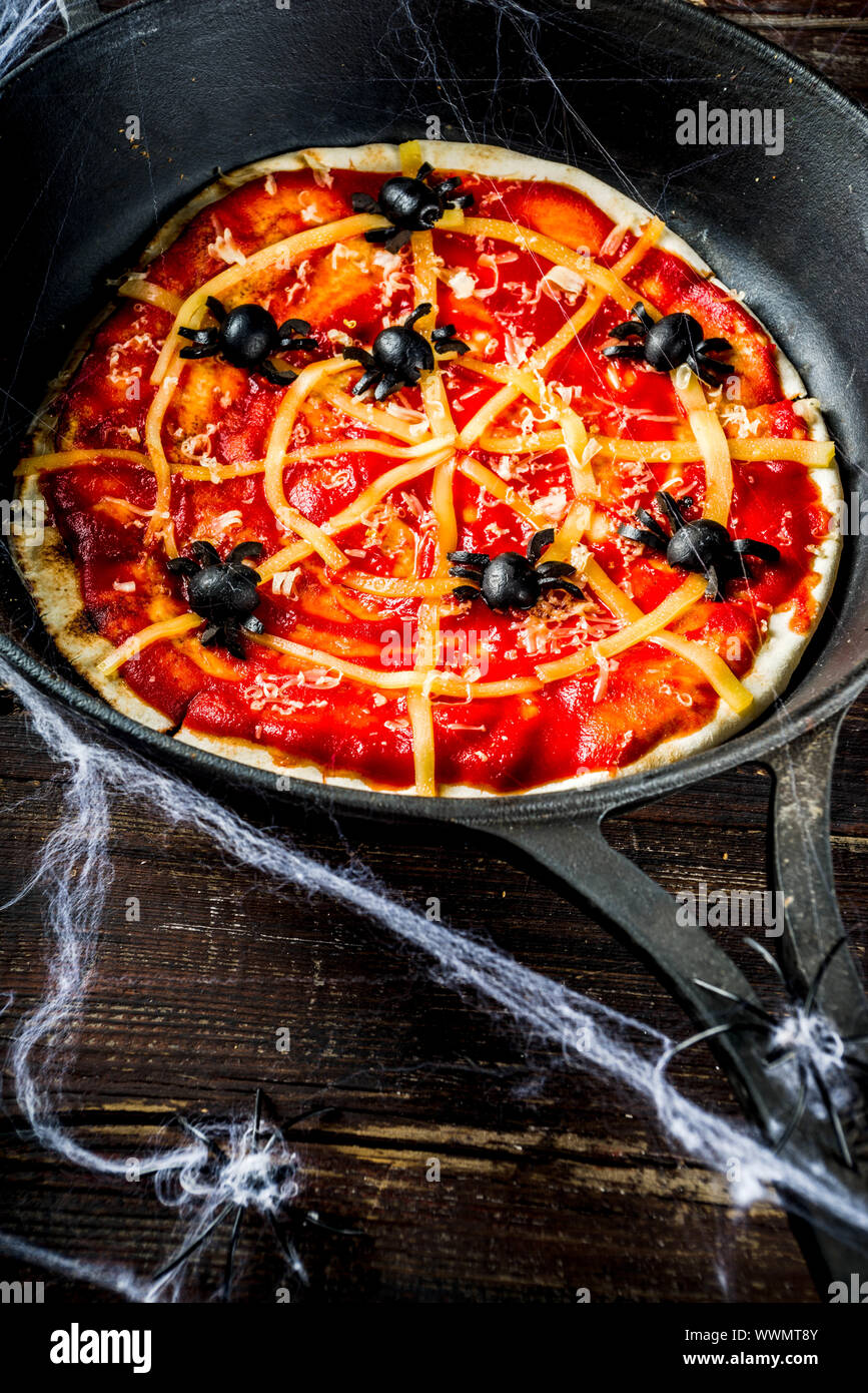 Halloween Spiderweb Pizza. Homemade kids party dish with tomato sauce ...