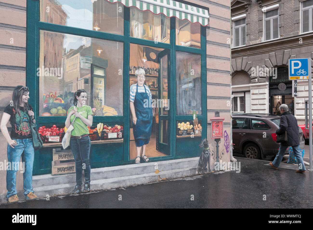 A view of a mural depicting a grocery shop on a building's wall Stock ...