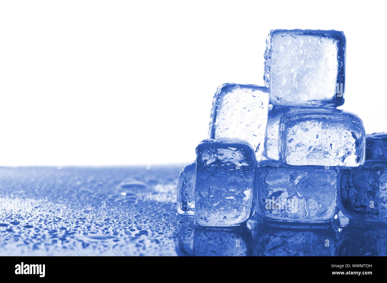 ice cubes and water drop in summer with copyspace Stock Photo - Alamy