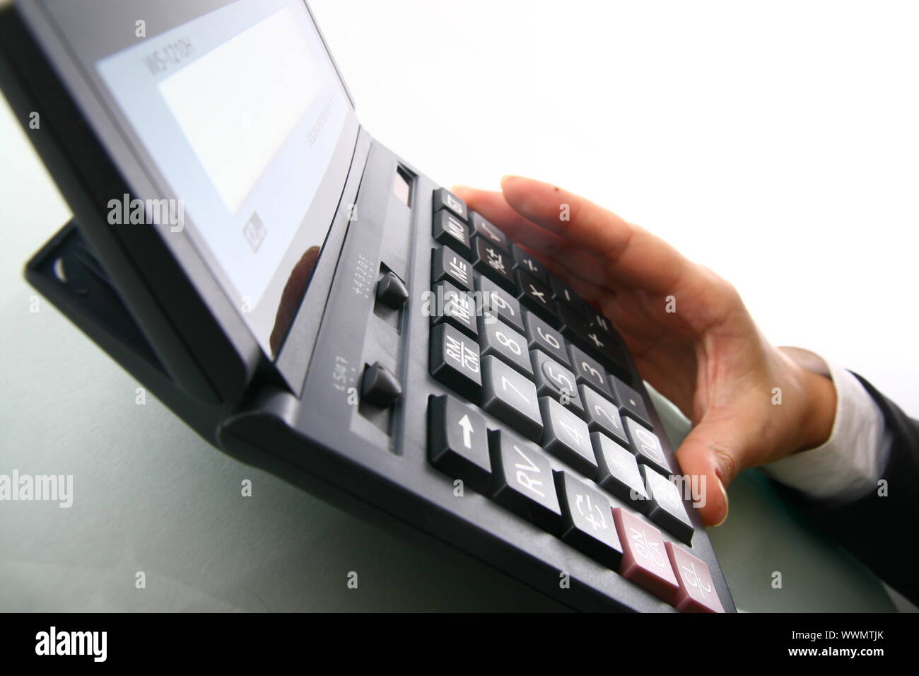 girl hand calculate on white background Stock Photo - Alamy