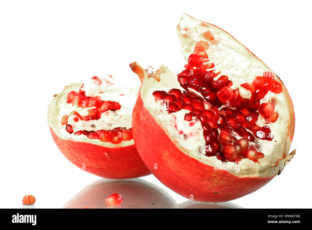 pomegranate macro close up on white background Stock Photo - Alamy