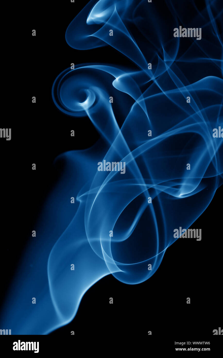 blue smoke on black background Stock Photo - Alamy