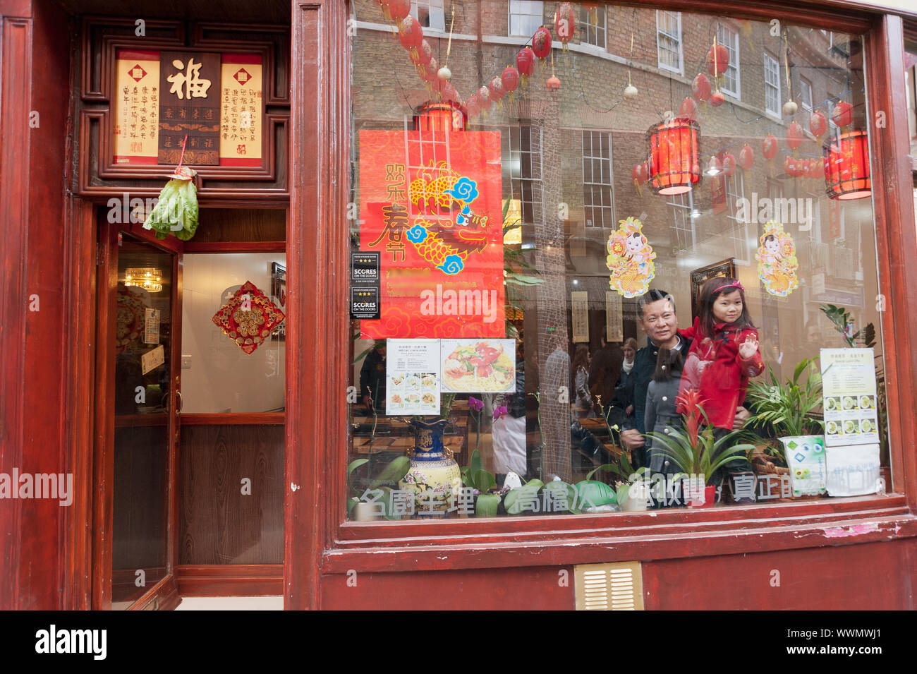 Members of the community watch the dancers Stock Photo - Alamy