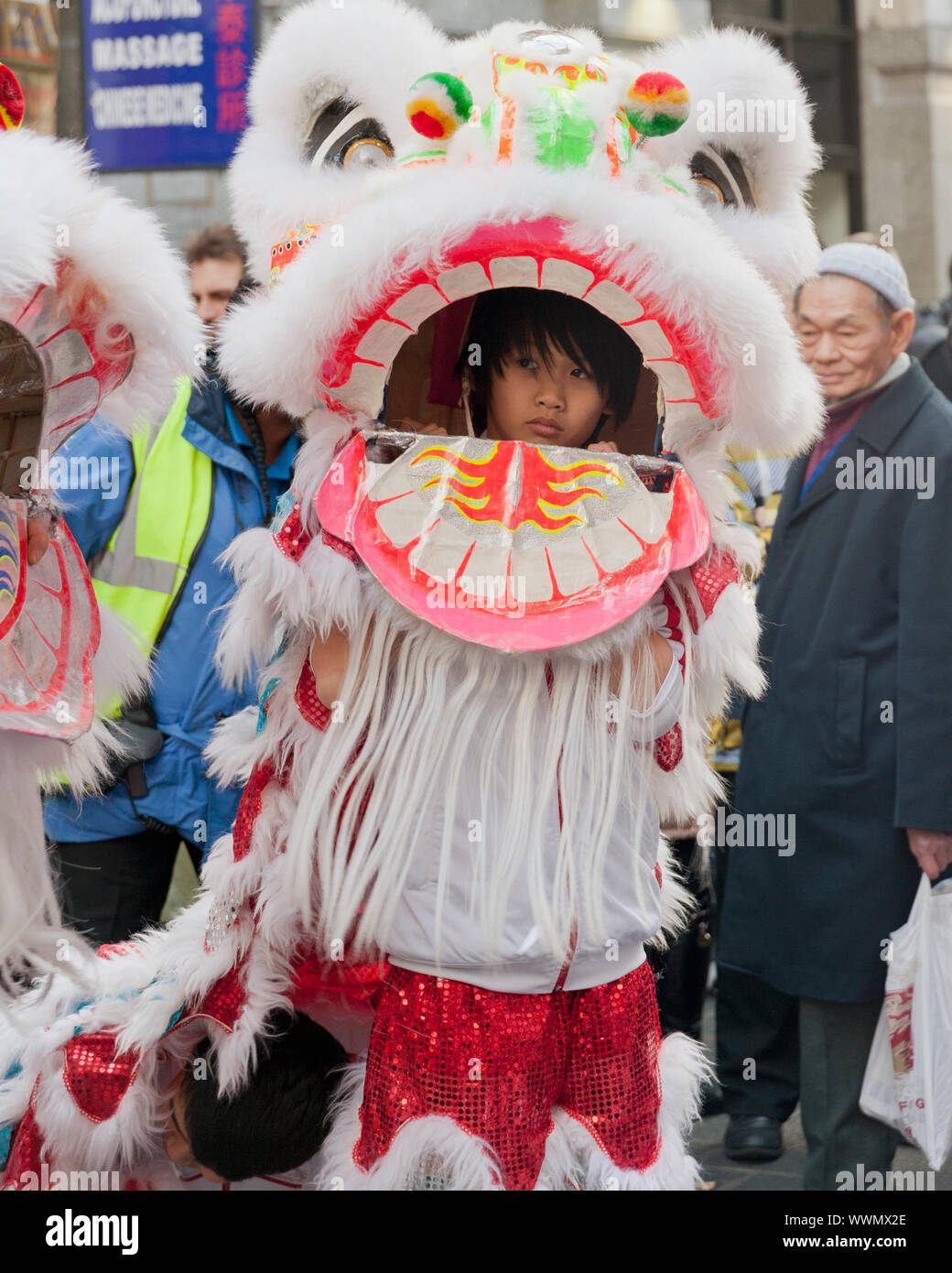 A lion dancer during Chinese New Year Stock Photo - Alamy