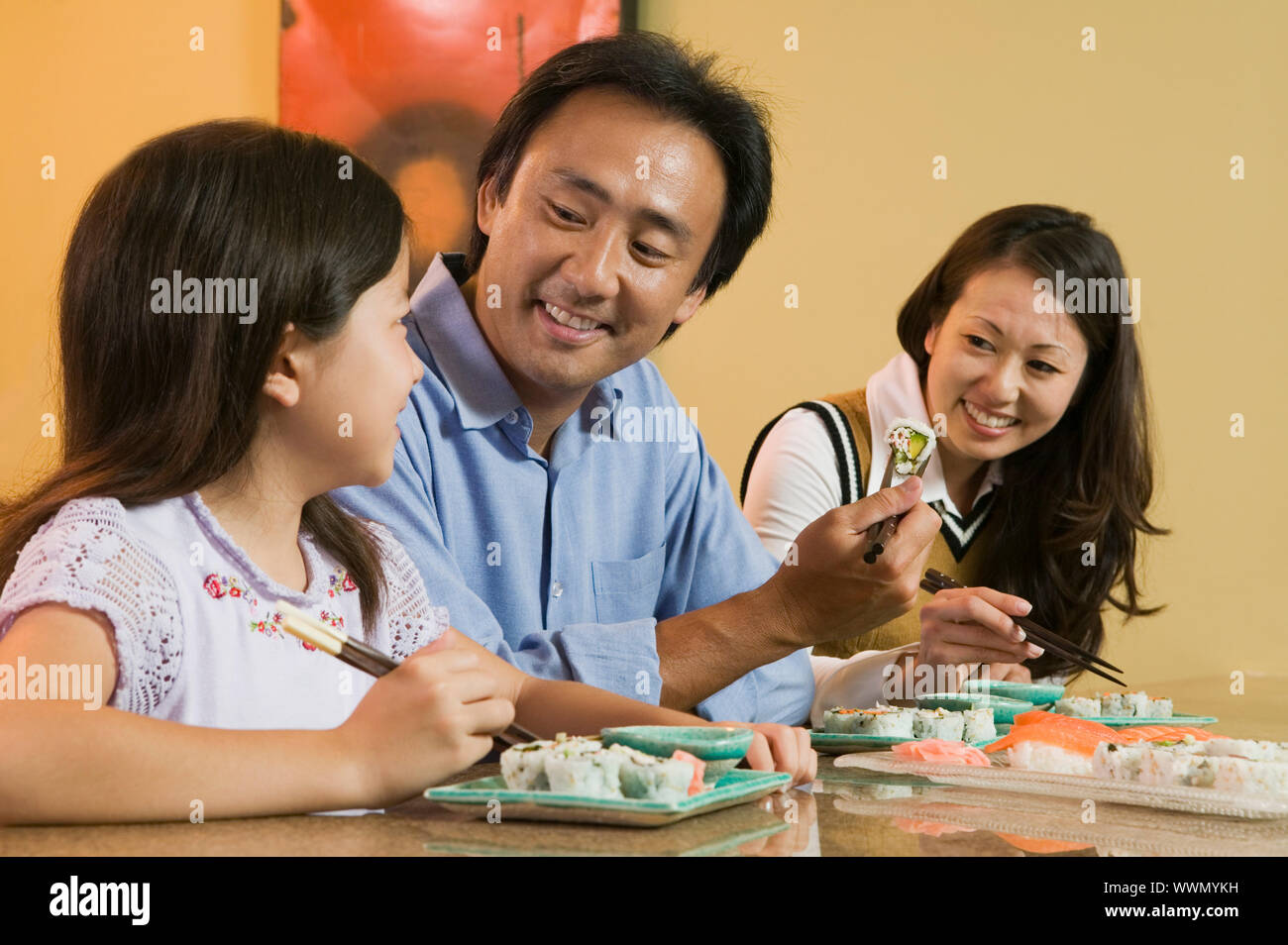 Family Eating Sushi Together Stock Photo - Alamy