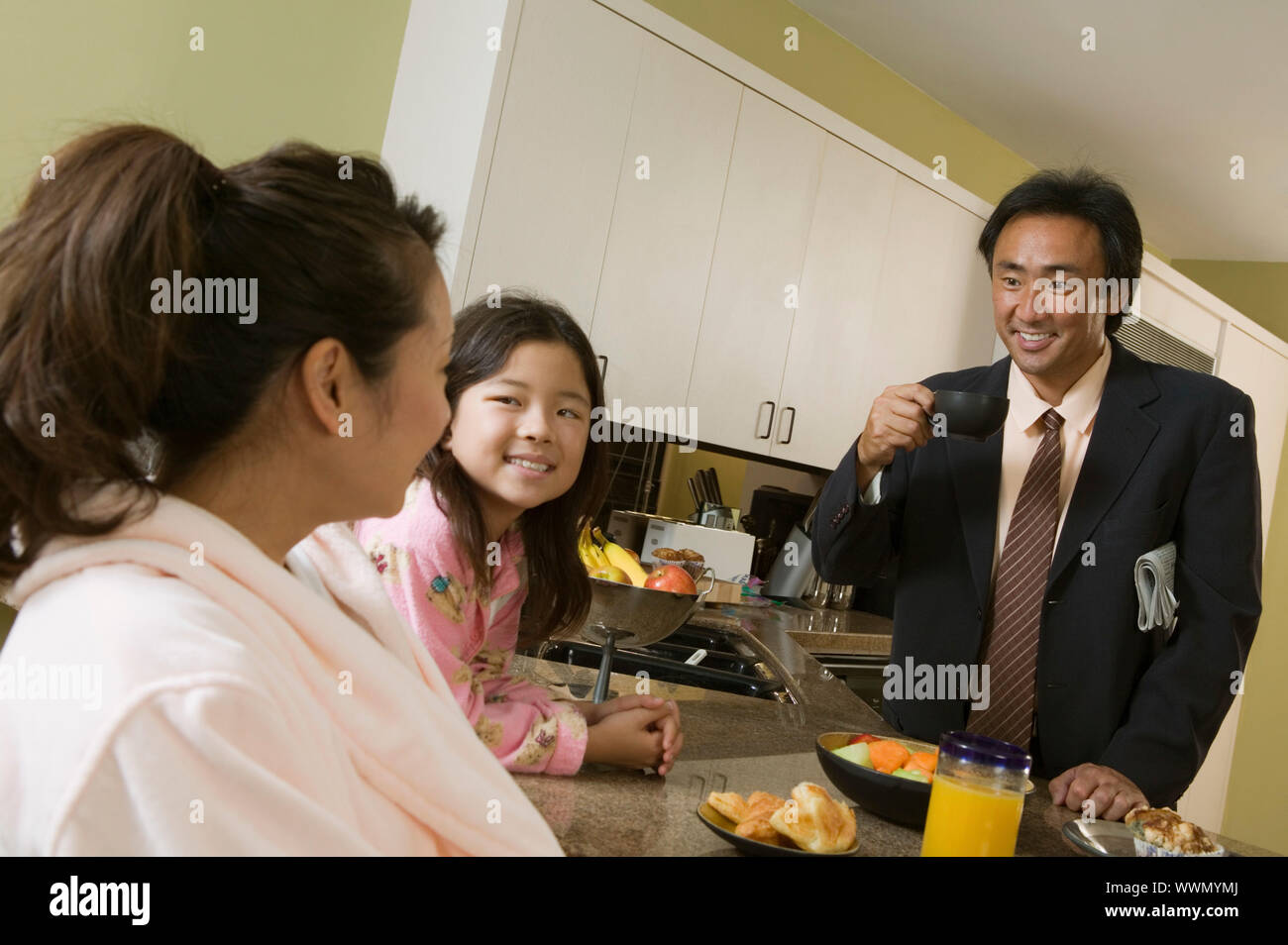 Family Eating Breakfast Together Stock Photo - Alamy