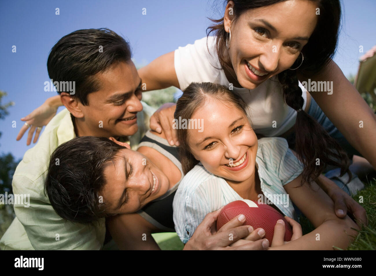 Couples Playing Football Stock Photo - Alamy