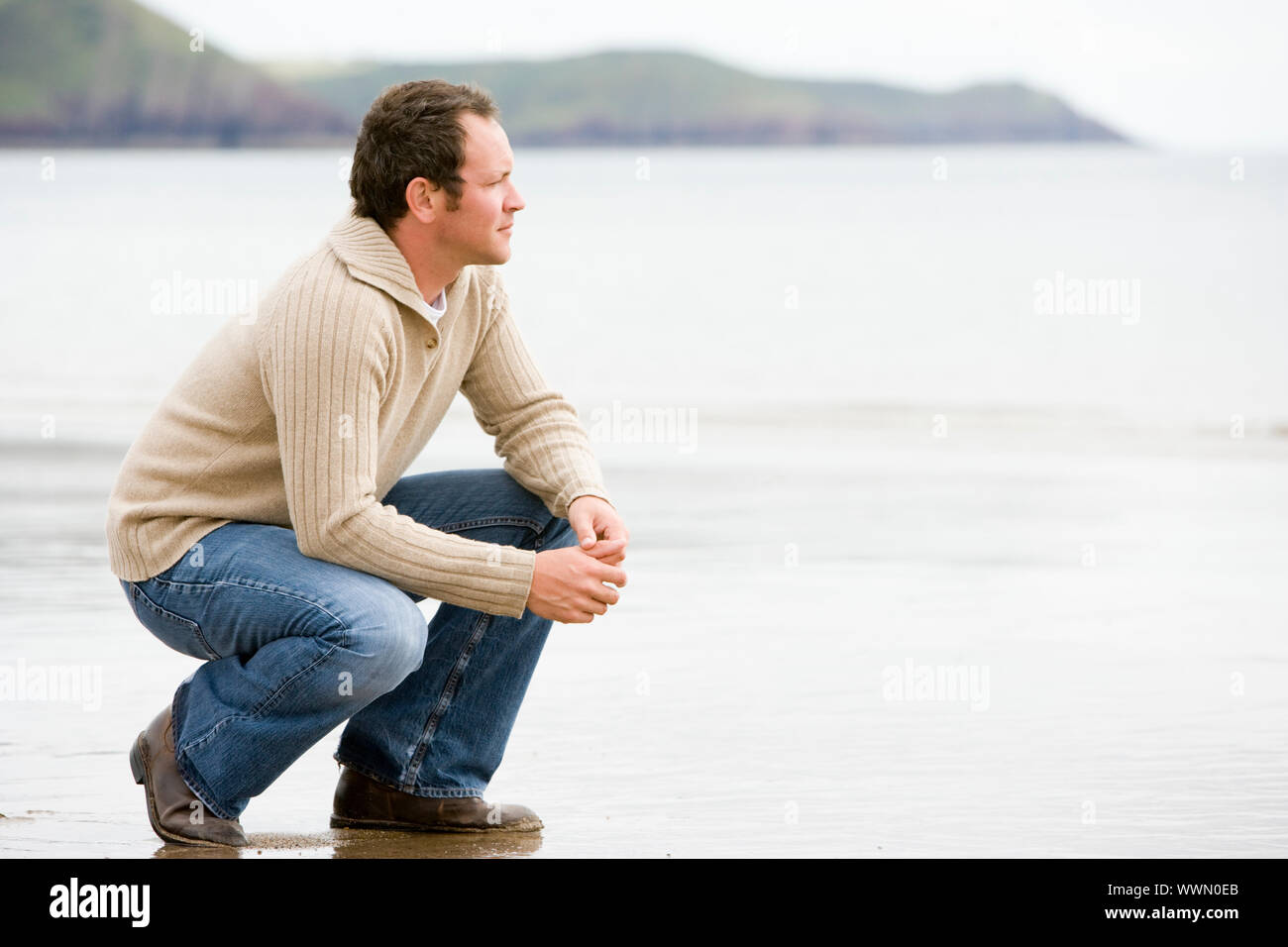 Man crouching walking hi-res stock photography and images - Alamy