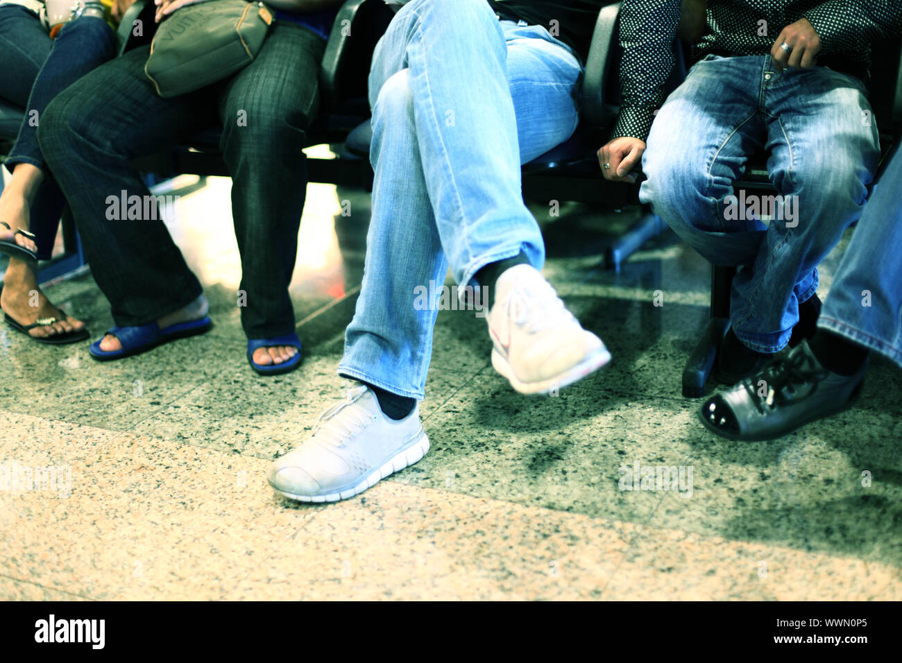 waiting arrival legs close up Stock Photo - Alamy