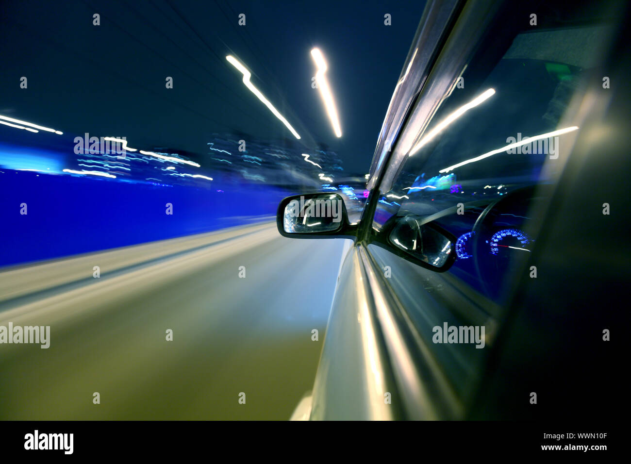 car fast drive on highway in night Stock Photo - Alamy