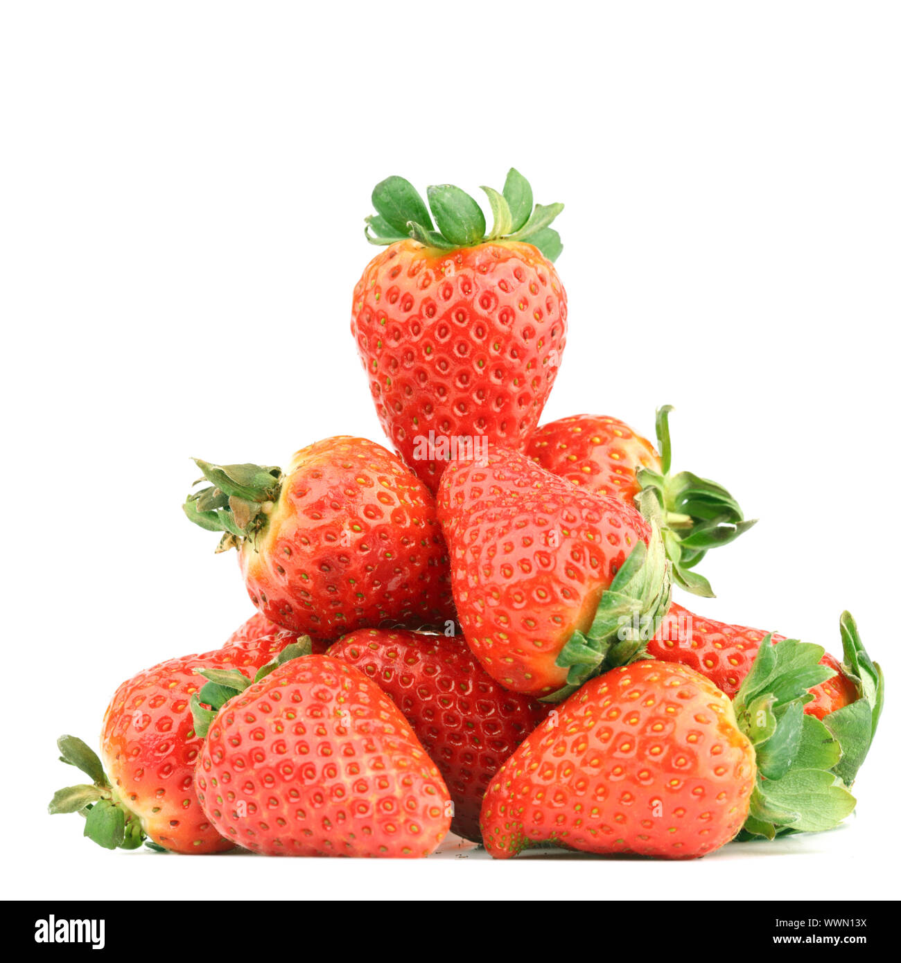 strawberry pile on white background Stock Photo - Alamy