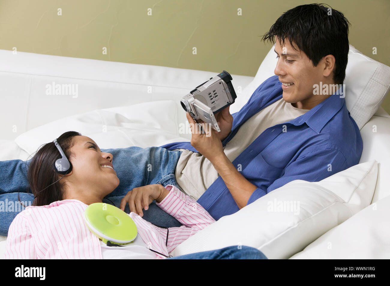 Couple with Portable CD Player and Video Camera Stock Photo - Alamy