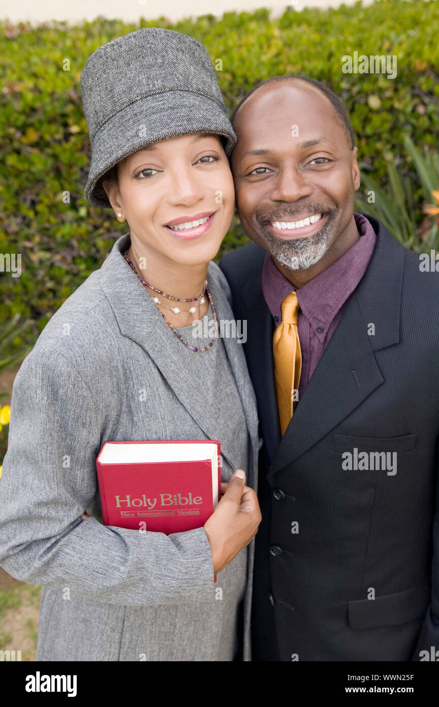 Religious Couple with Bible Stock Photo - Alamy