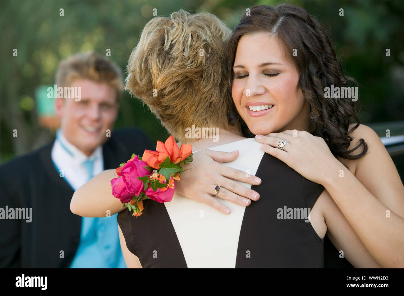 Friends Hugging at Prom Stock Photo - Alamy