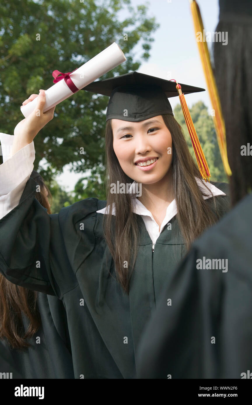 Graduate Holding Diploma Stock Photo - Alamy