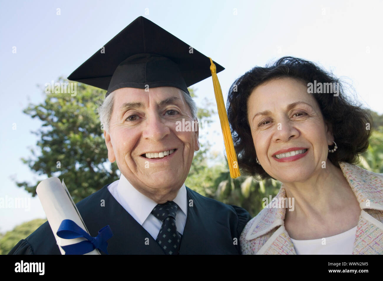 Graduate with Wife Stock Photo - Alamy
