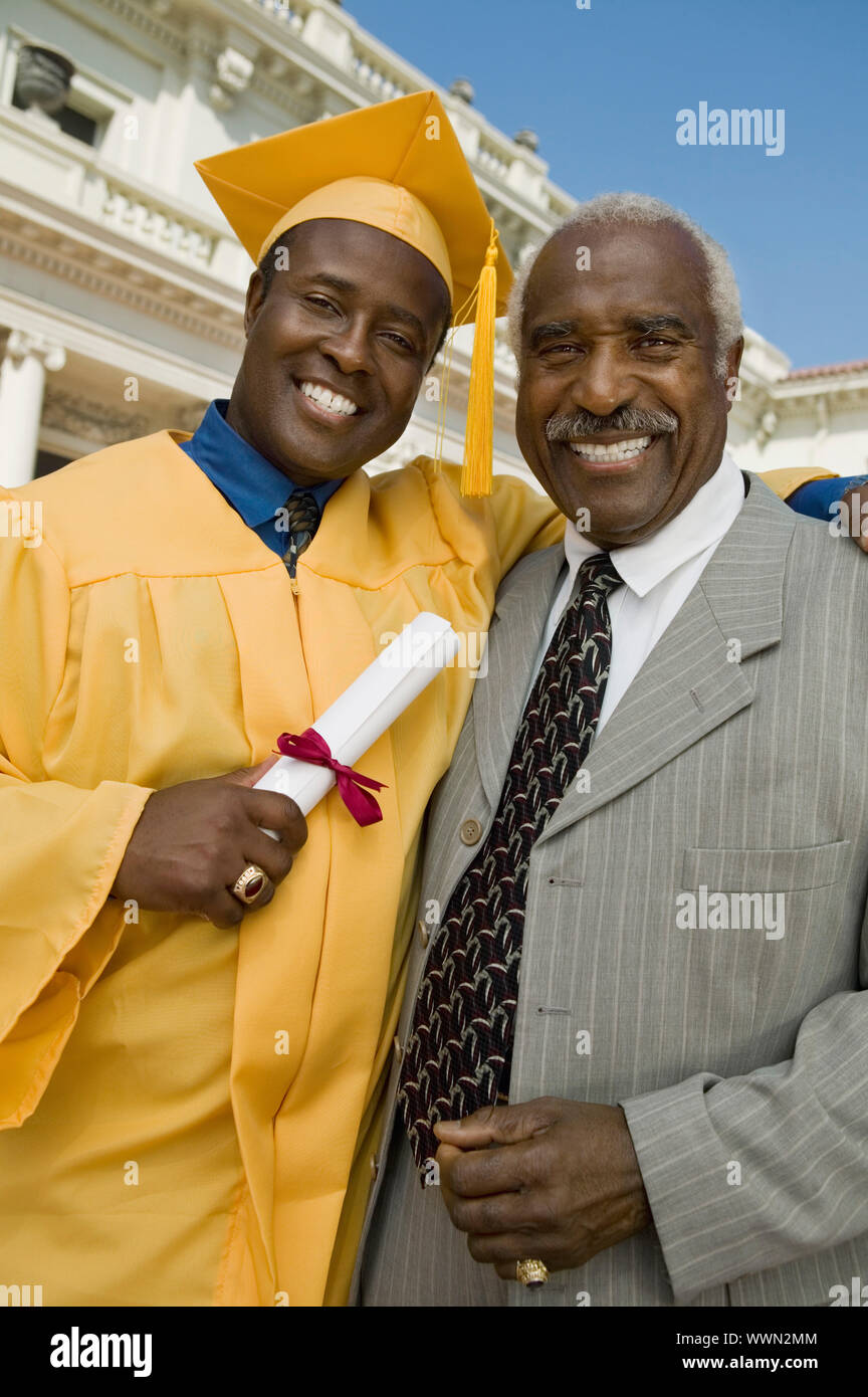 Graduate with Father Stock Photo - Alamy