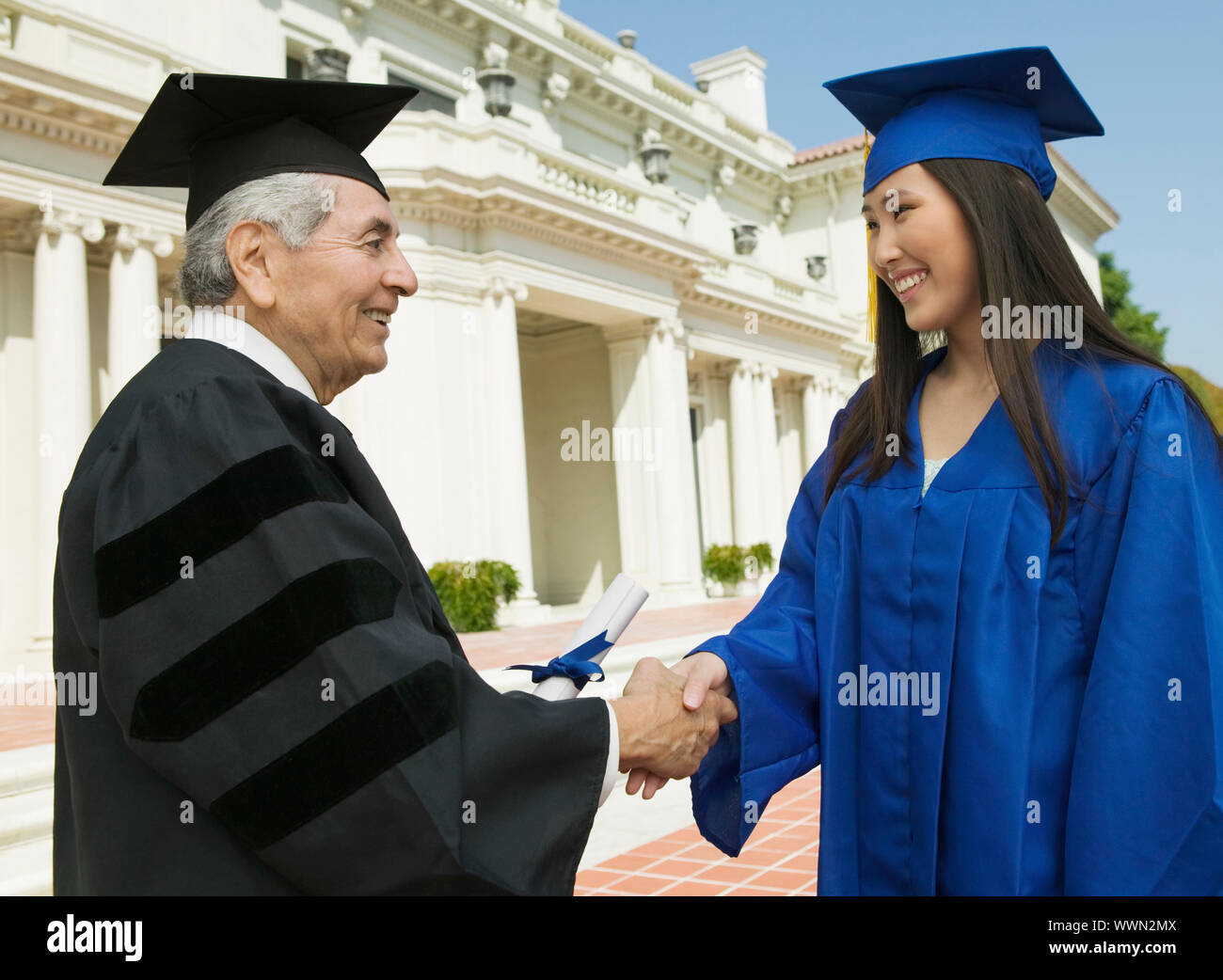 Graduate Receiving Diploma Stock Photo - Alamy