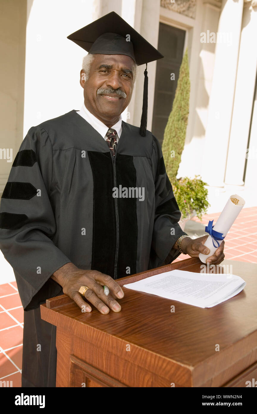 Senior Graduate with Diploma Stock Photo - Alamy