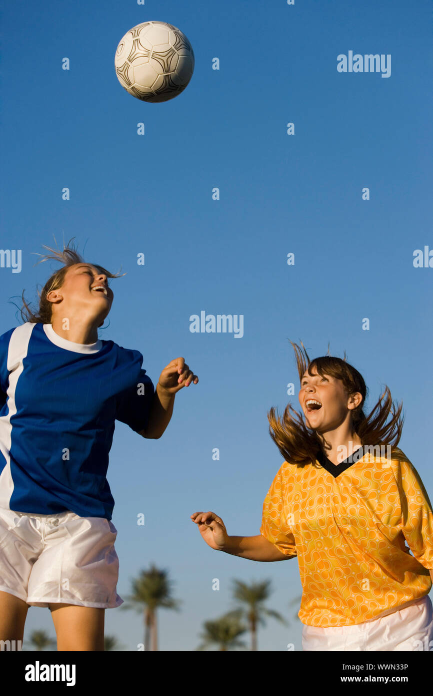 Girl heading football hi-res stock photography and images - Alamy