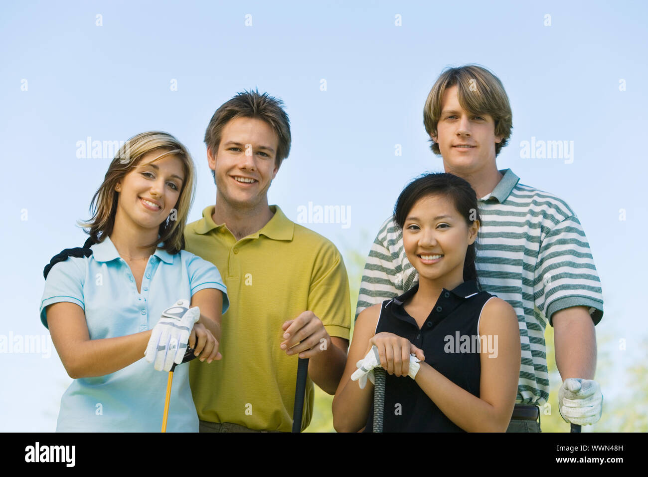 Friends Golfing Together Stock Photo - Alamy